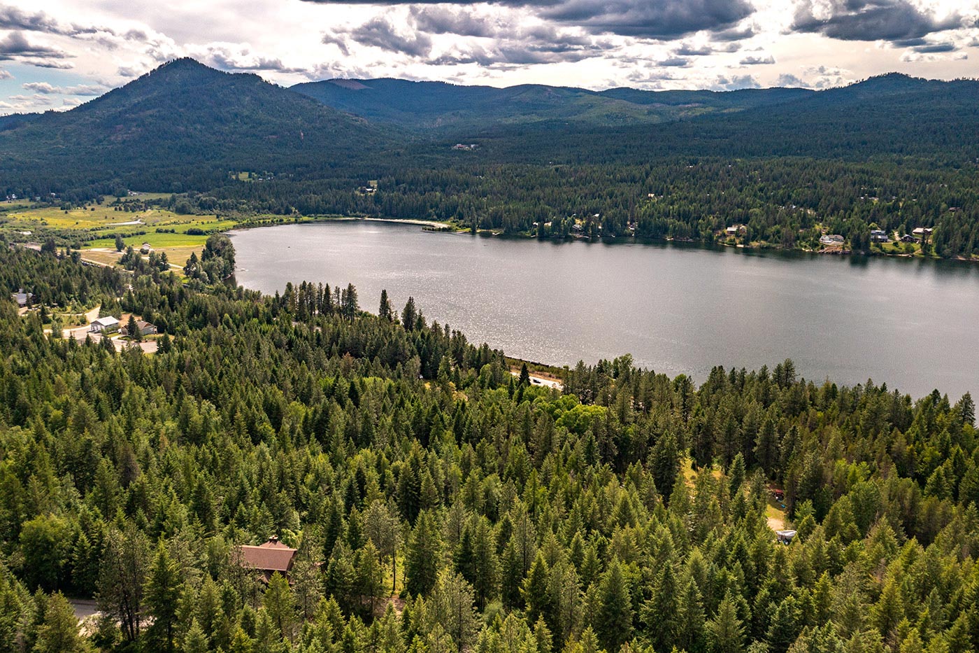 Stunning Craftsman home w/views of lake Cocolalla on 2.56 acres wooded ...